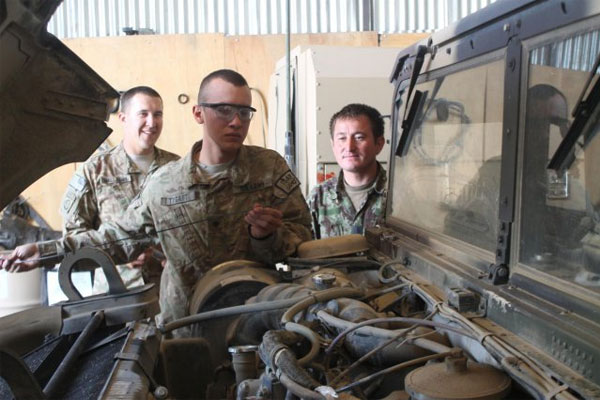 Army Mechanics Help ANA Repair Vehicles | Military.com